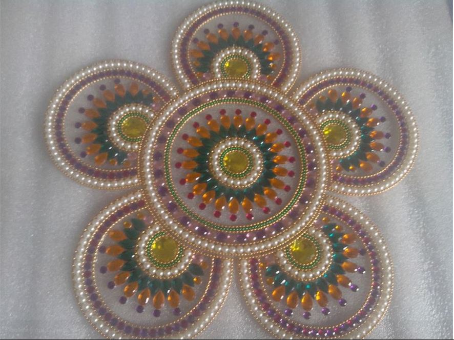 The Ephemeral Colours of Rangoli Art - The Yellow Sparrow